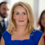 Elisabeth Opie - International Institute of Communications